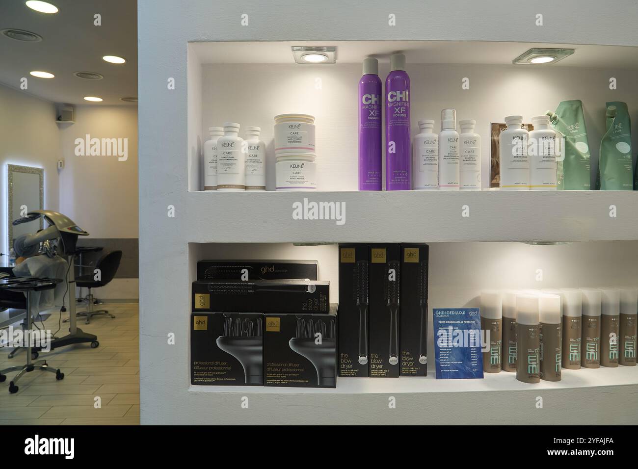 Interior shelf of a women's hair salon with hair and feminine beauty ...
