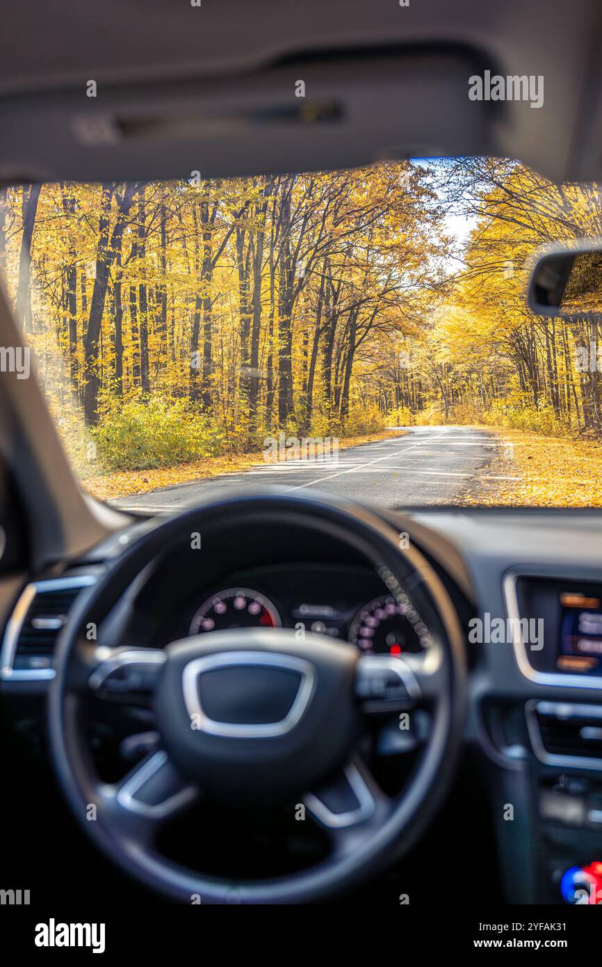 Car steering wheel and interior. Road view from inside the car Stock ...