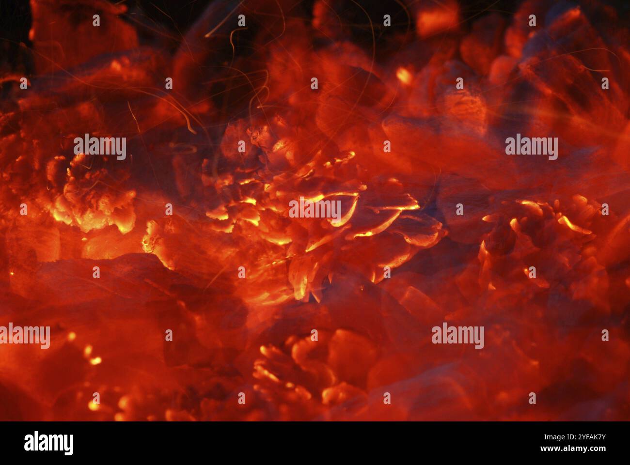 Burning coal, Fire flames background Stock Photo - Alamy