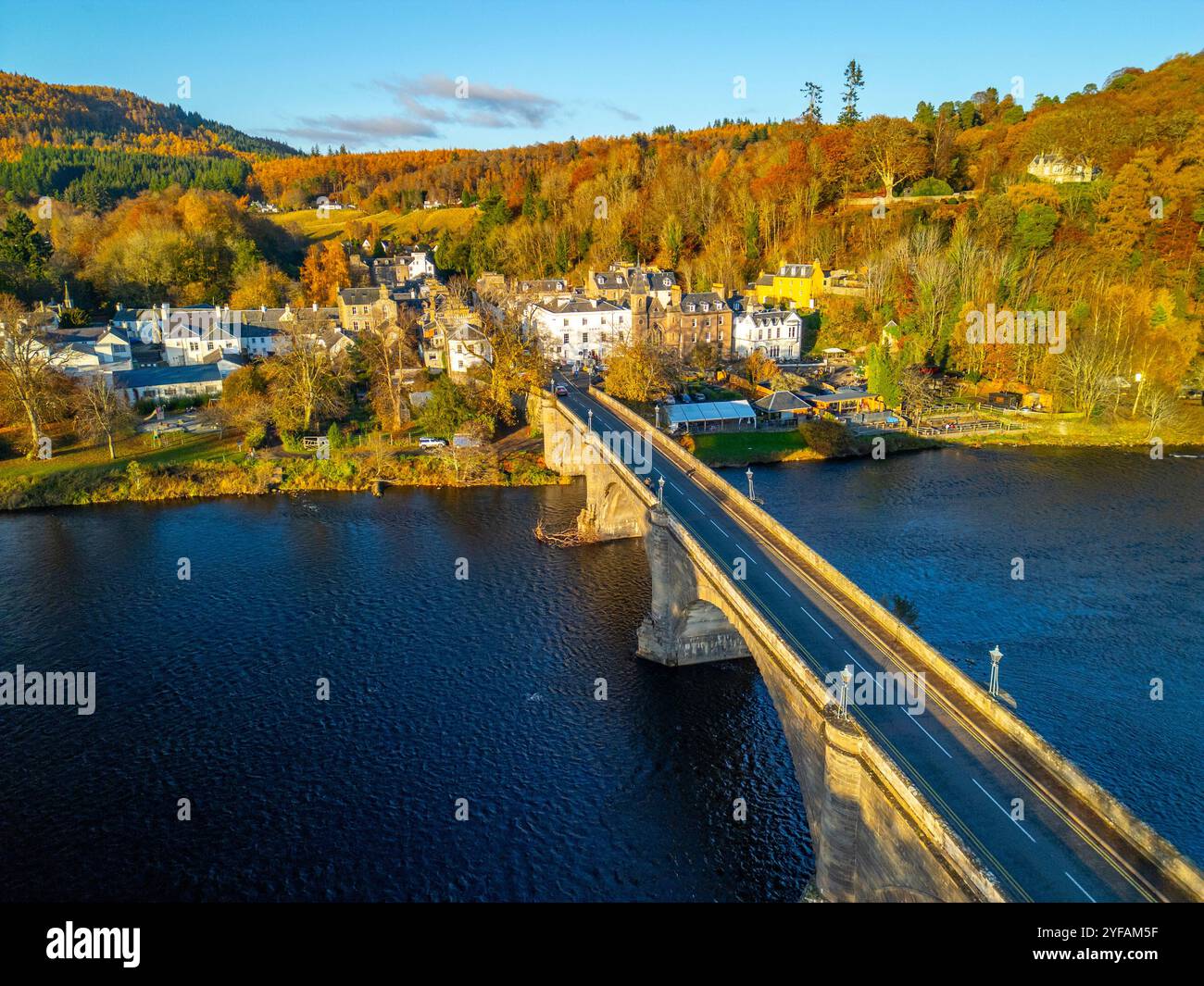 Aerial view of Dunkeld village and River Tay in autumn colours ...