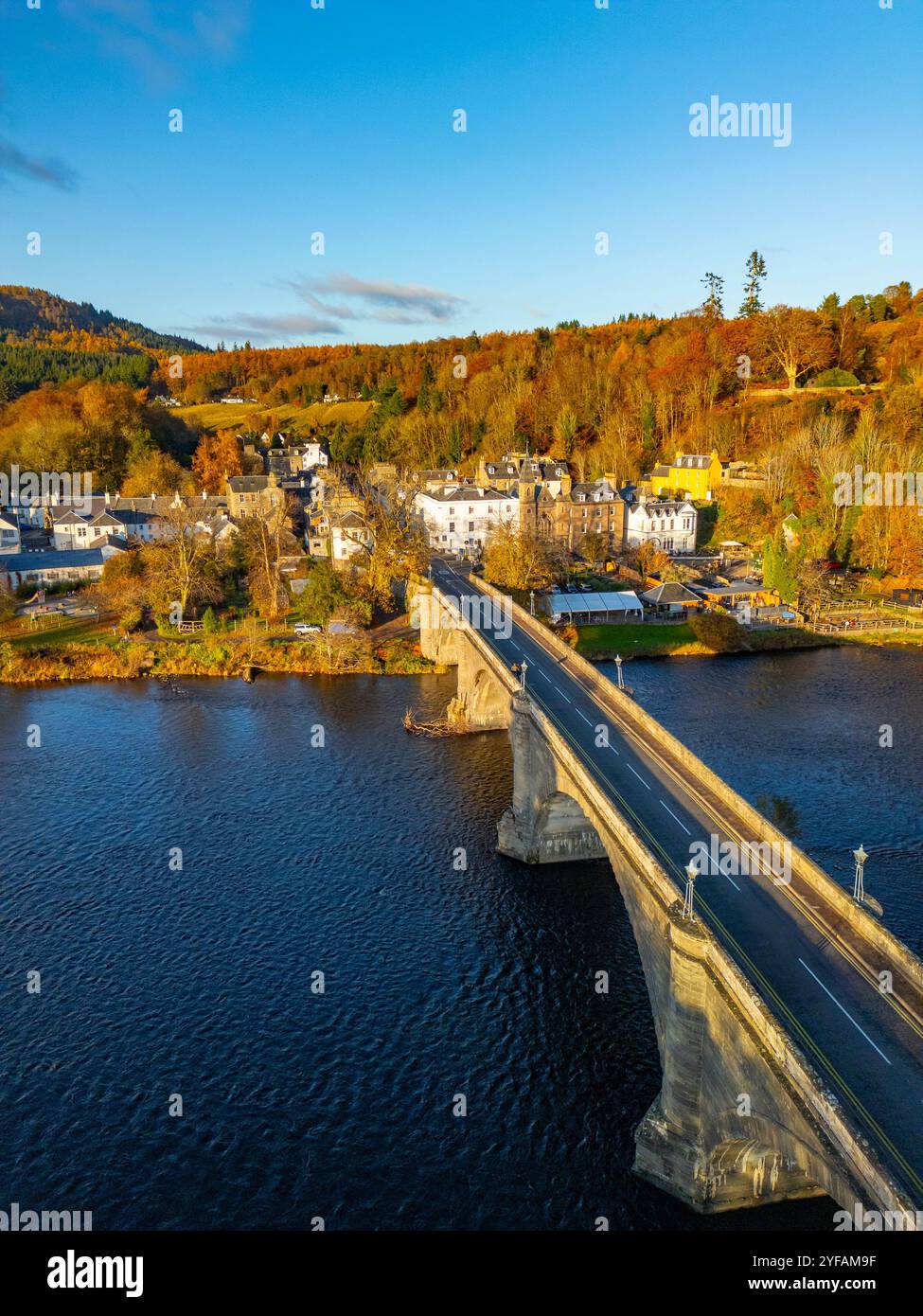 Aerial view of Dunkeld village and River Tay in autumn colours ...