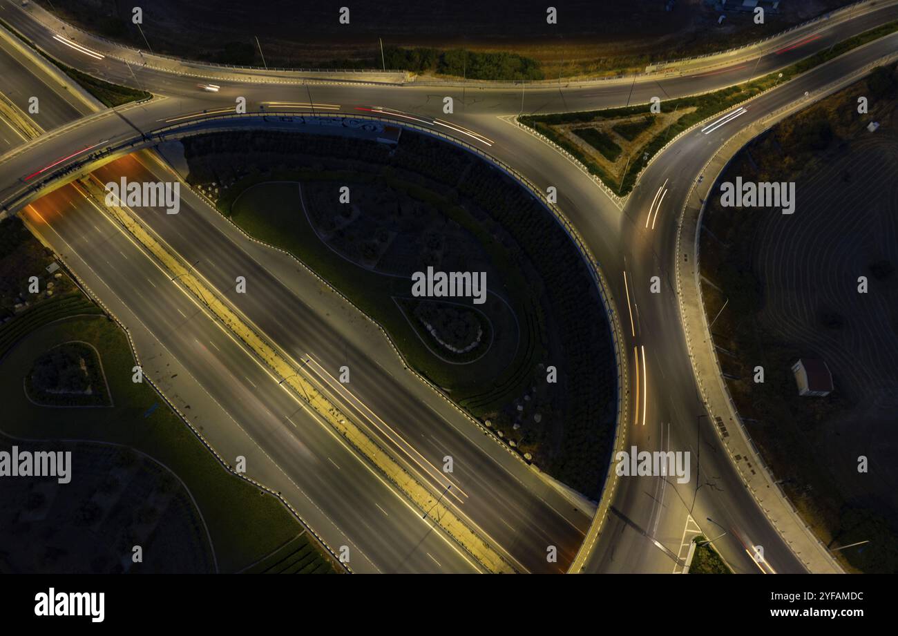 Aerial drone top view of a modern motorway junction roundabout with ...