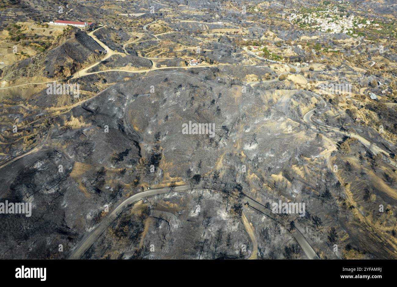 Mountain fire with burned agriculture land and forest. Odou village ...
