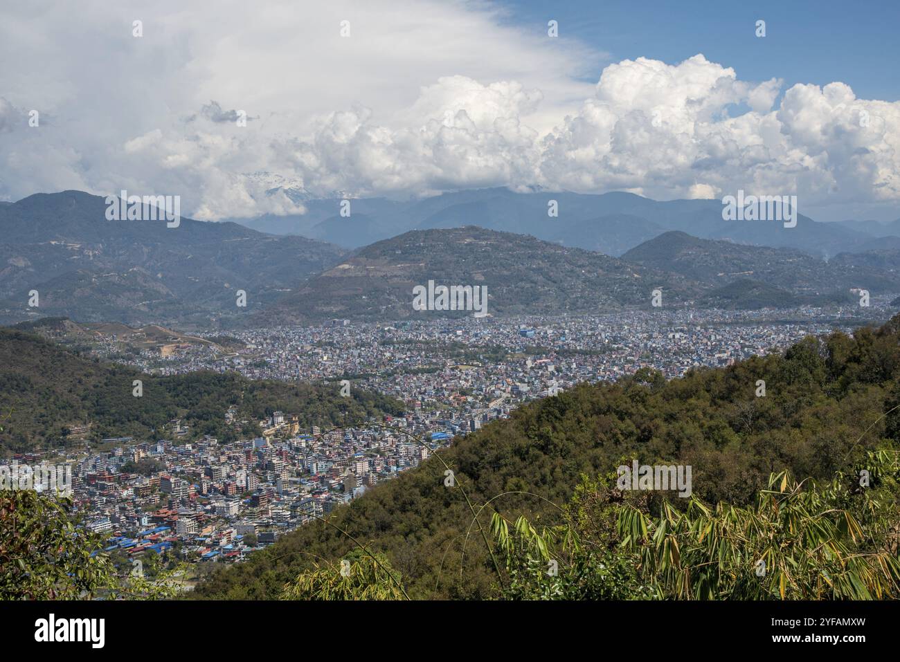 The cityscape of Pokhara with the Annapurna mountain range covered in ...