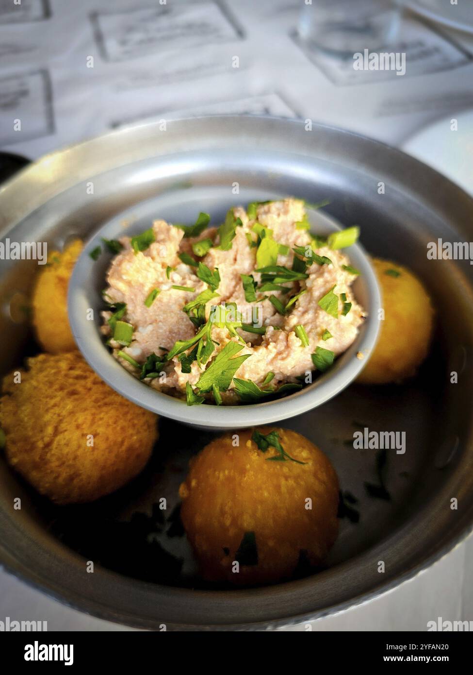 Fried mozzarella, cheddar cheese bites, balls and garnish Stock Photo ...