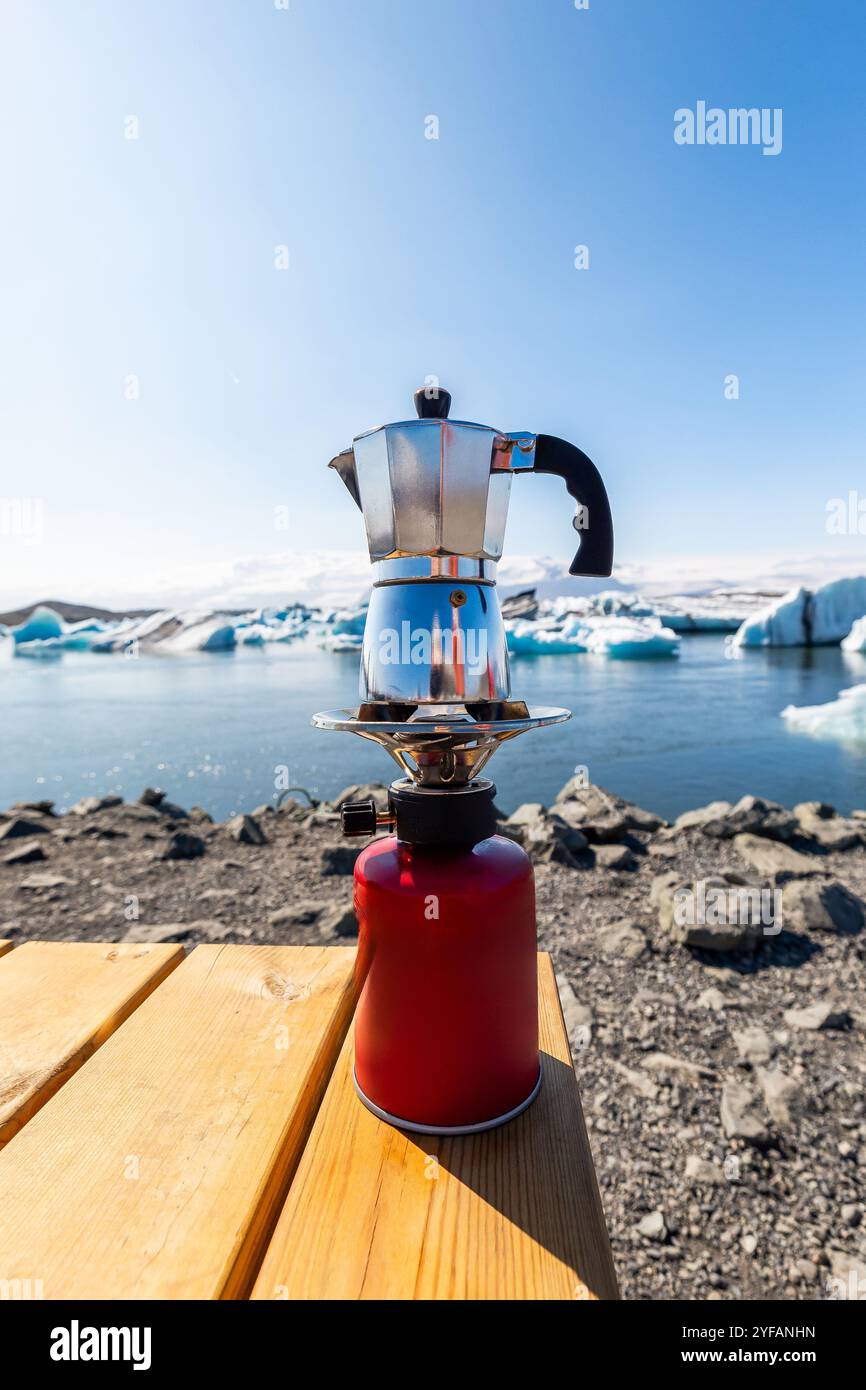Moka pot brewing coffee by an Icelandic glacier on a sunny day Stock ...