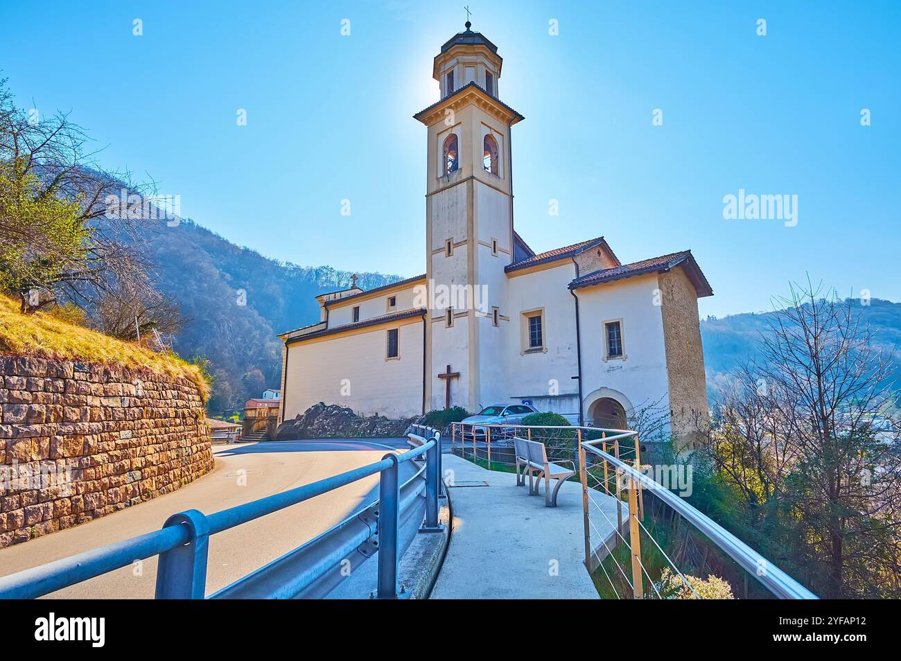 The medieval San Siro Church with tall bell tower, located along Via ...