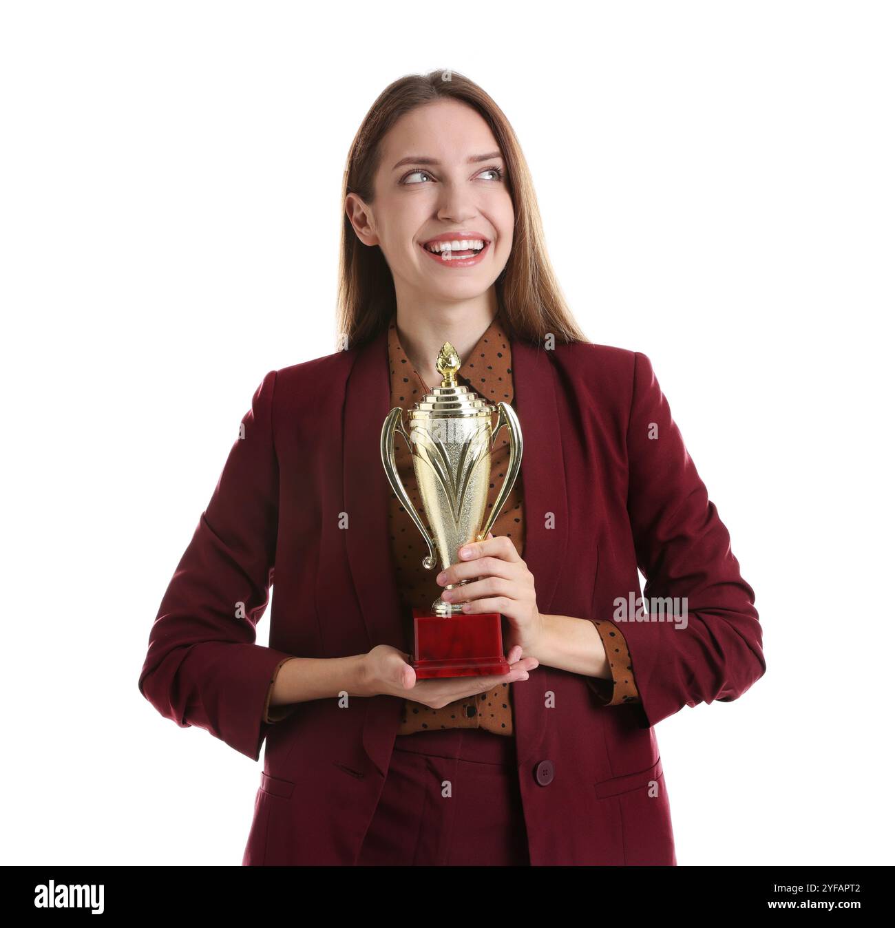 Happy winner with gold trophy cup on white background Stock Photo - Alamy