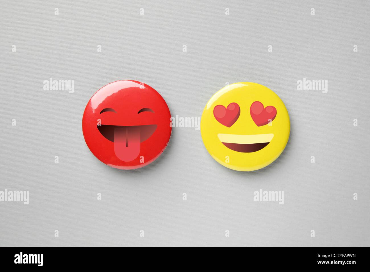 Badges displaying different emotions on grey background Stock Photo - Alamy