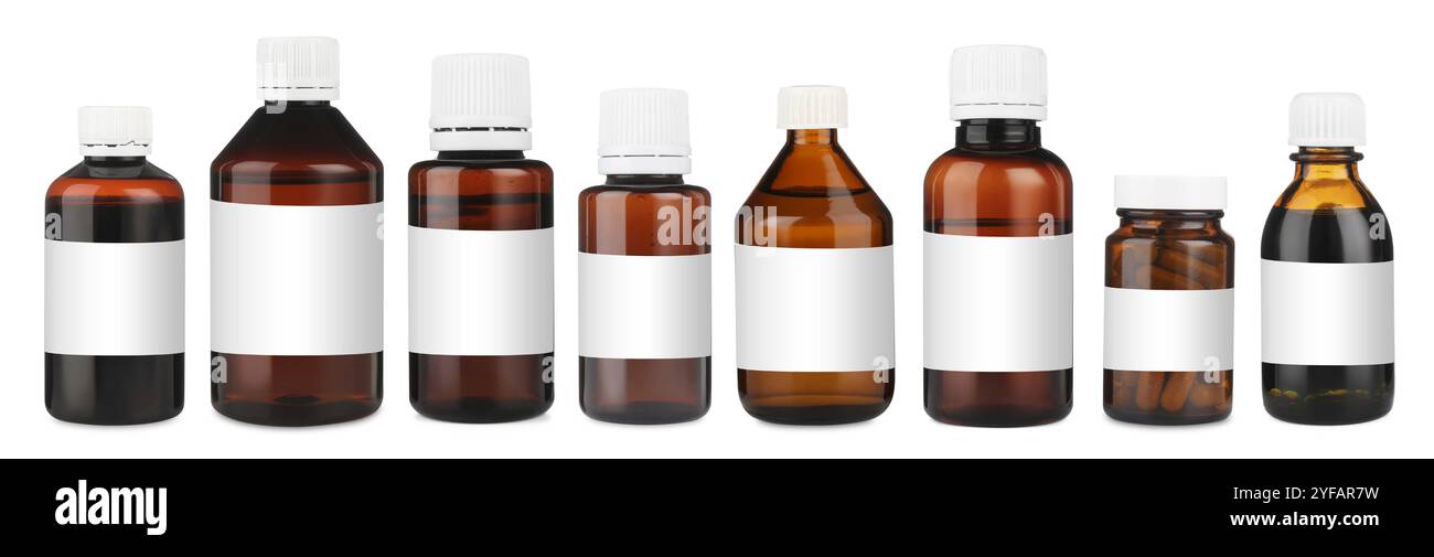 Many different glass bottles with labels isolated on white Stock Photo ...