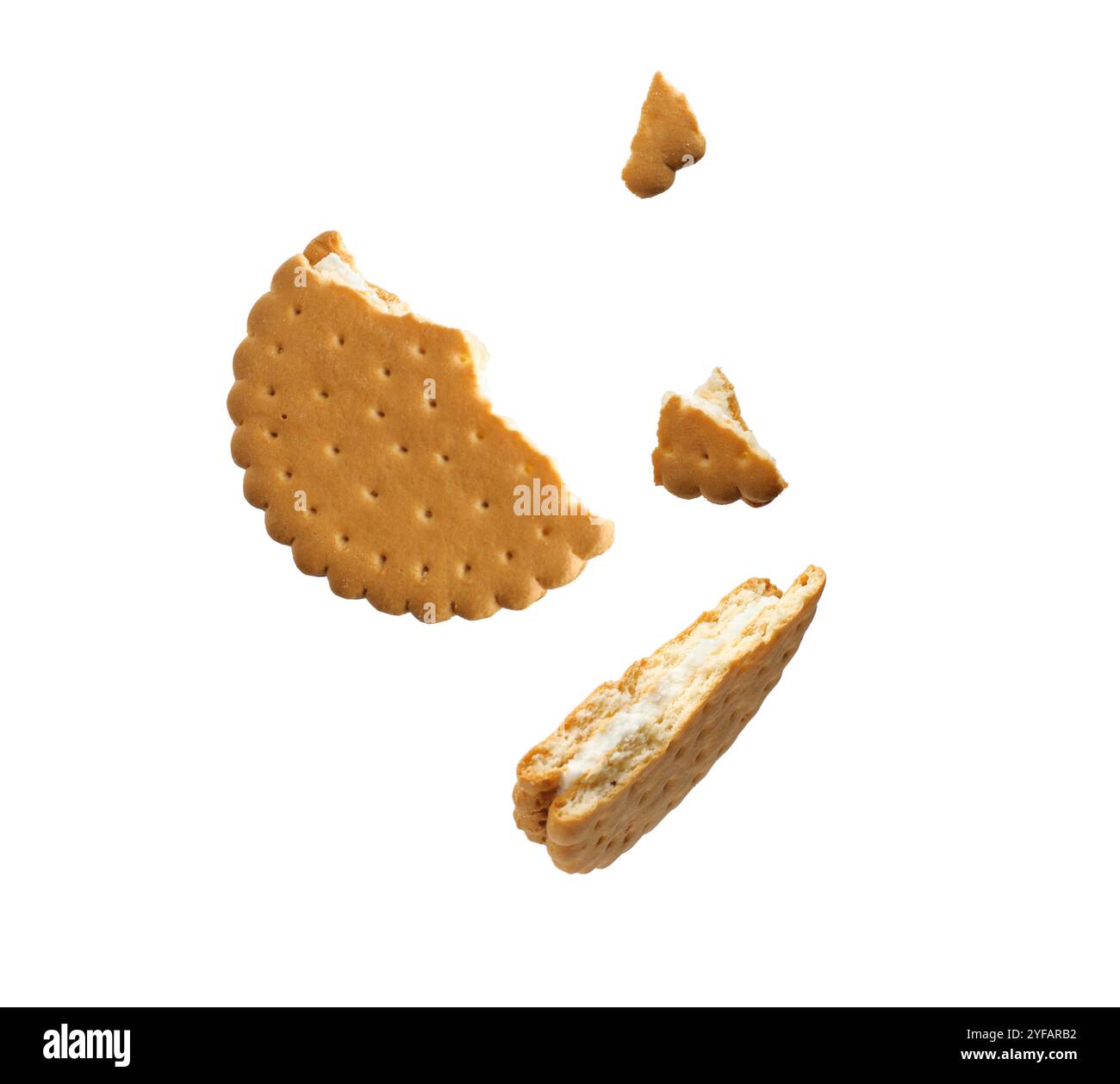 Tasty broken sandwich cookie in air on white background Stock Photo - Alamy
