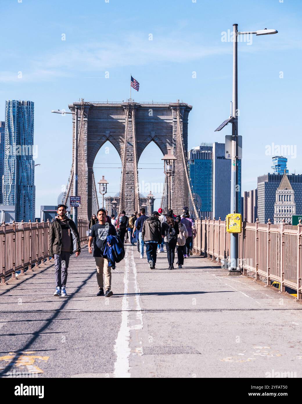 Brooklyn, New York, USA – October 28, 2024: People walk across the ...