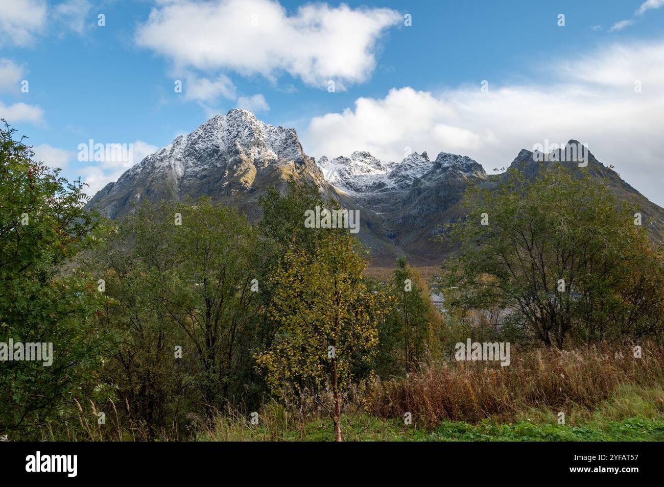 The snow-capped mountains above the village of Laupstad on the island ...