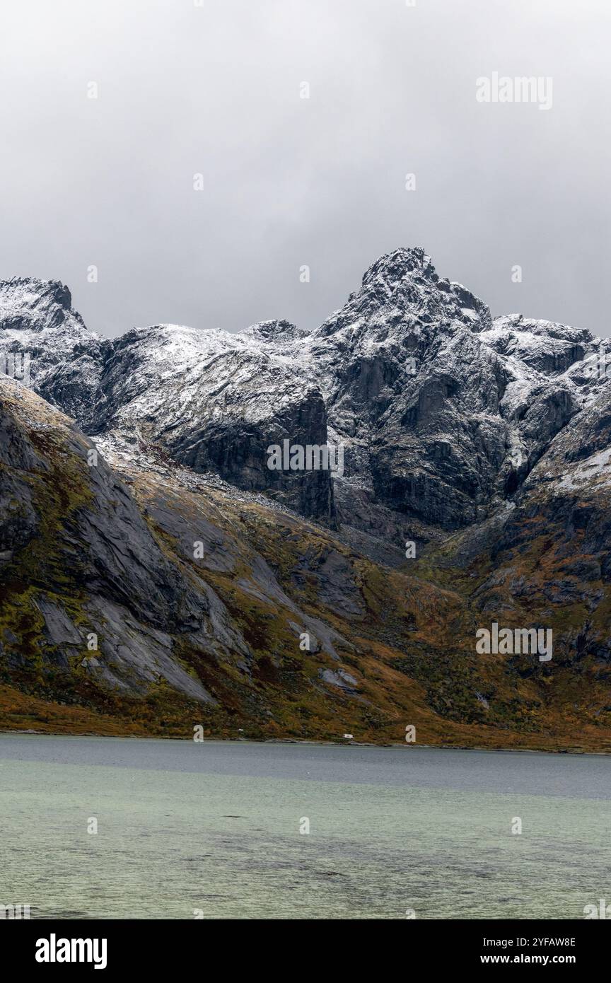 Snow-capped peaks in the Nordland region between Moskenes and Leknes on ...