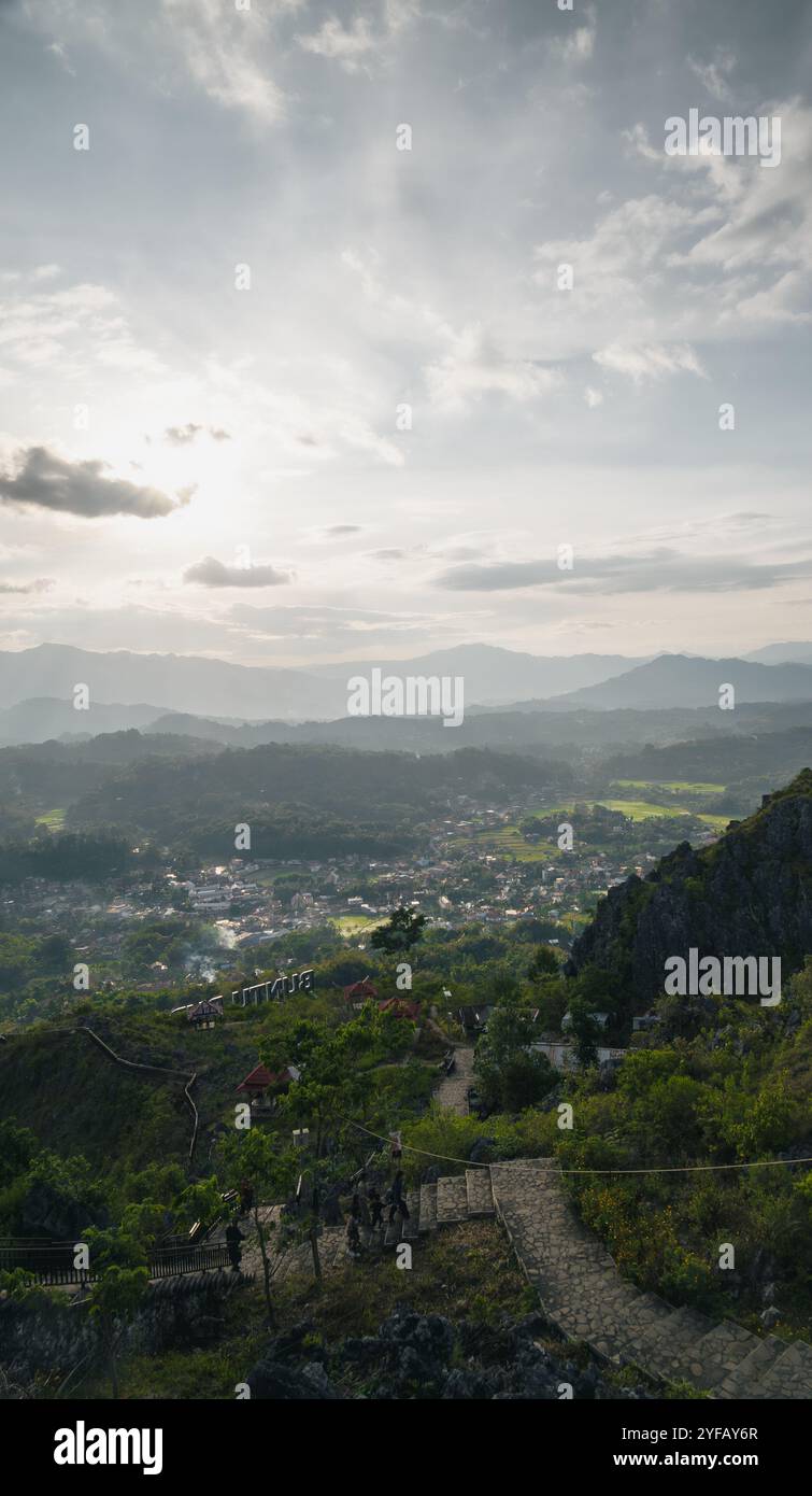 View of the mist-covered mountains of Tana Toraja seen from the top of ...
