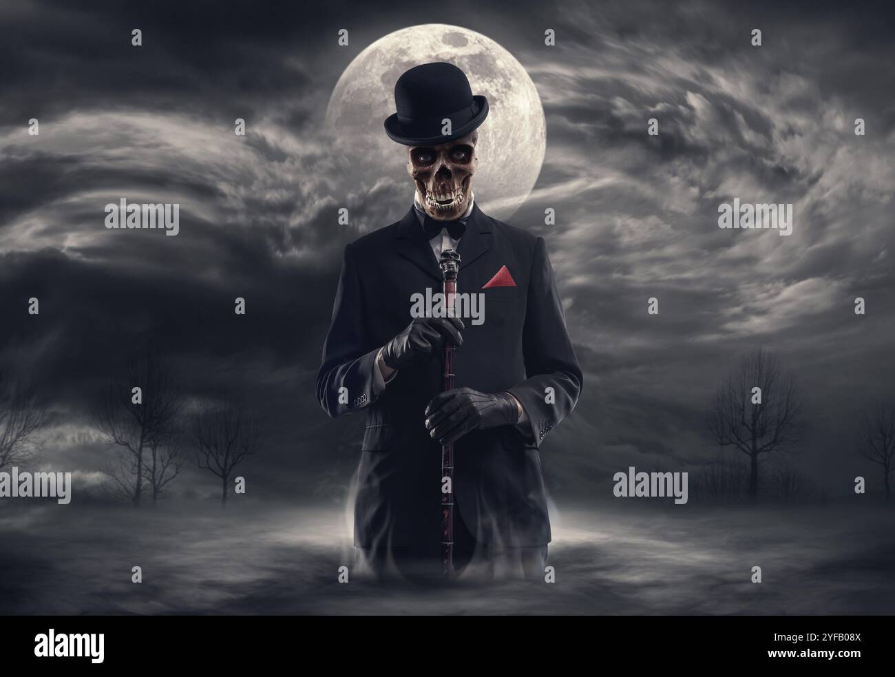 Creepy evil character with skull head surrounded by fog and darkness ...