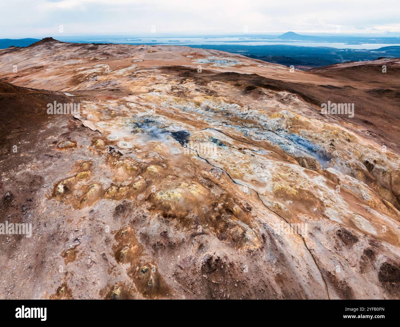 Aerial view of Hverir Geothermal Area, Iceland, showcasing vibrant blue ...