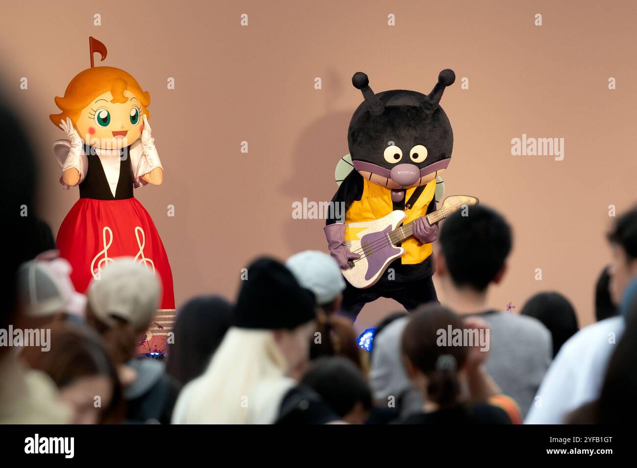 Mizumaki, Fukuoka, Japan - October 26, 2024: Kids and parents watch ...