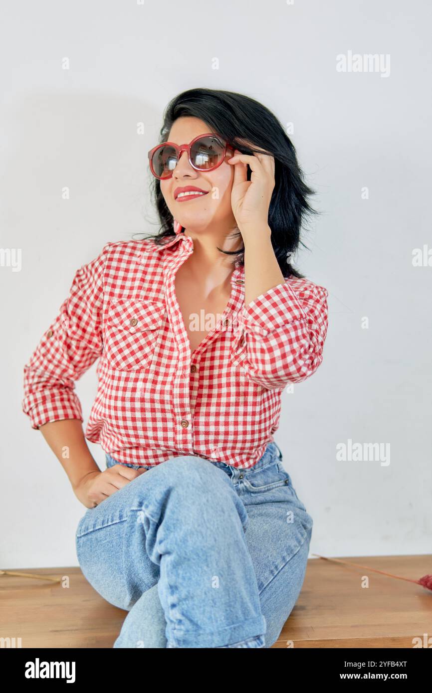 Person wearing plaid shirt hi-res stock photography and images - Alamy