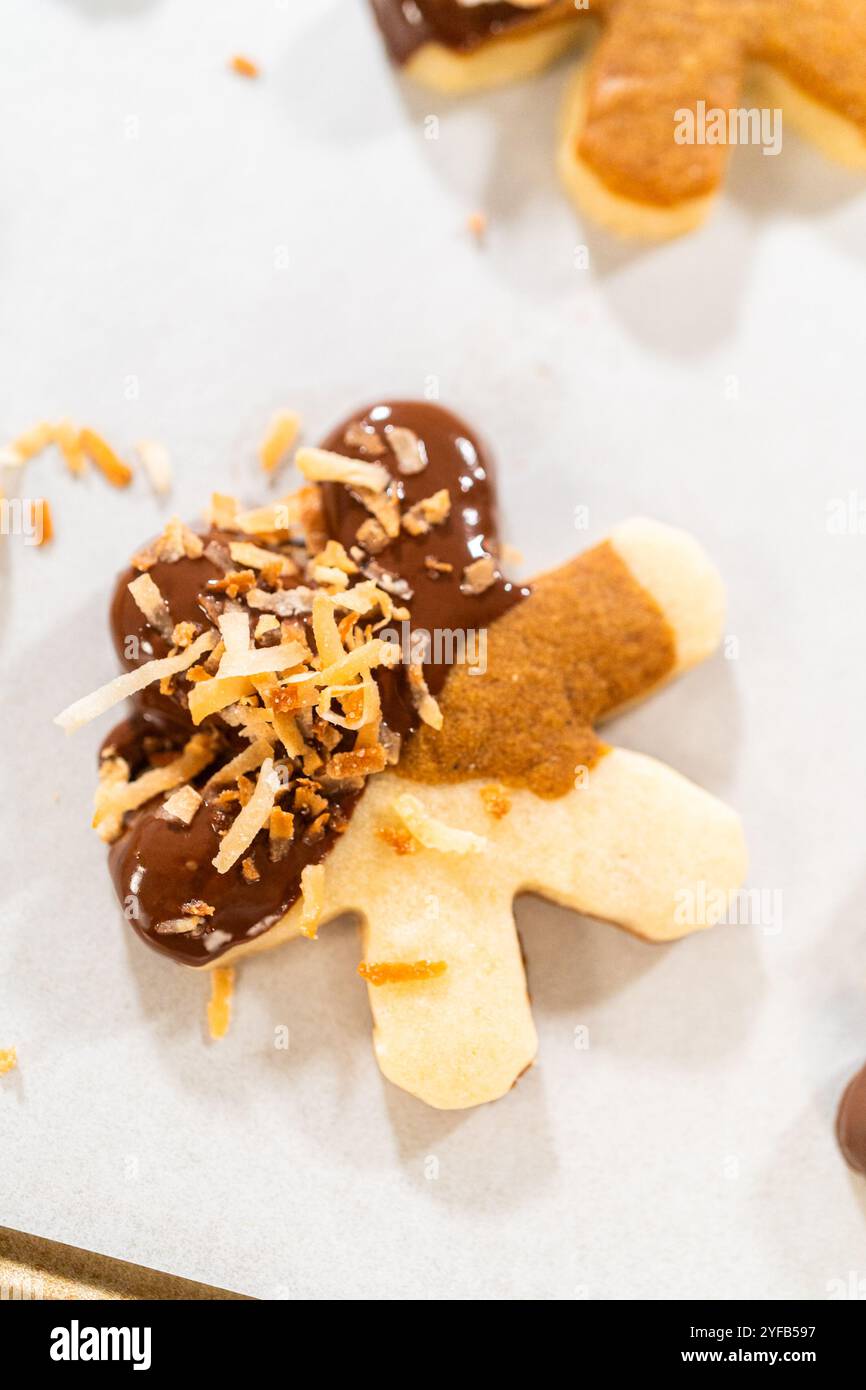Chocolate-Dipped Gingerbread Men with Golden Toasted Coconut Stock ...