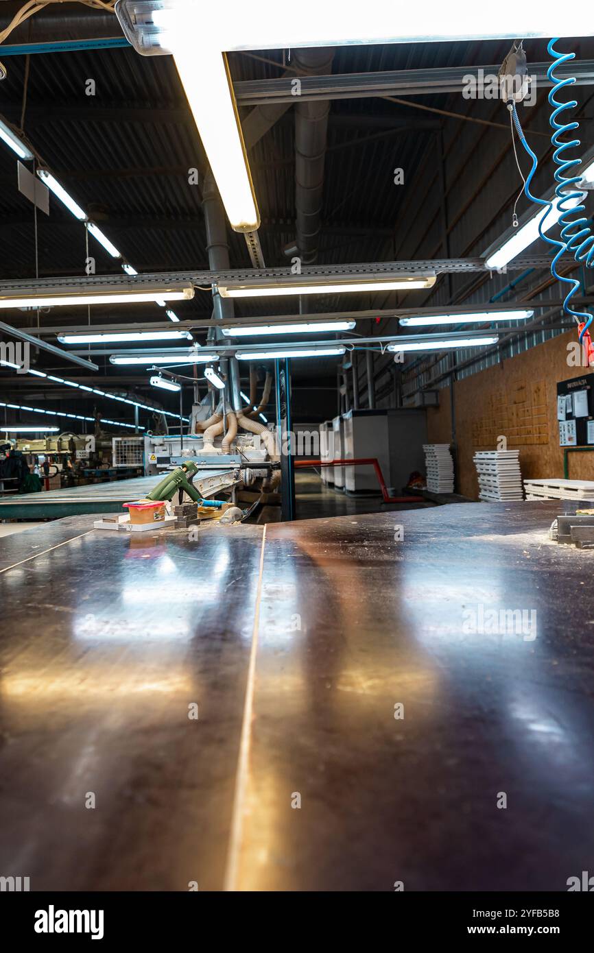 View of a clean and organized industrial workspace with modern ...