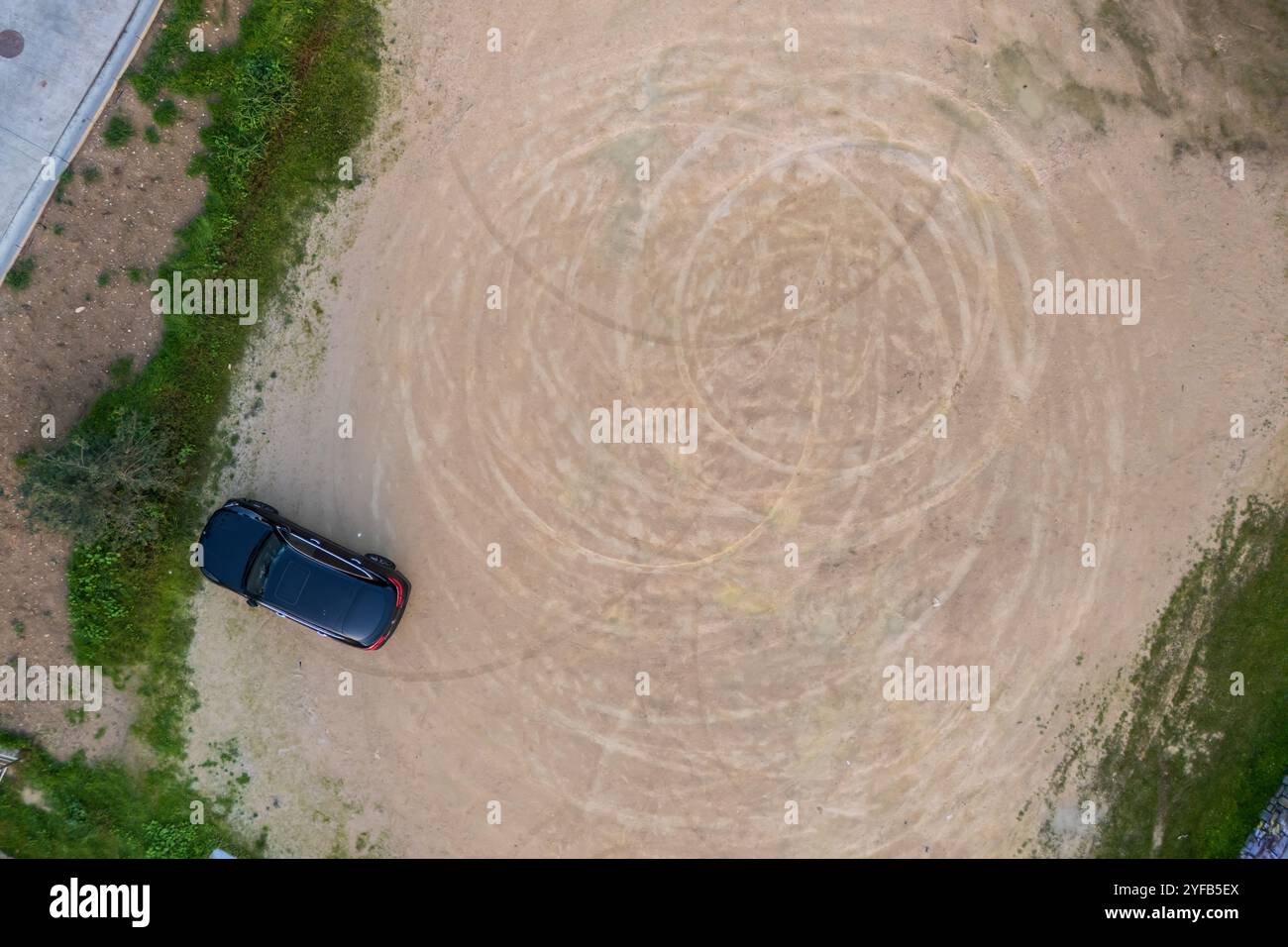 Aerial view of the markings on the ground in a dirt parking lot Stock ...