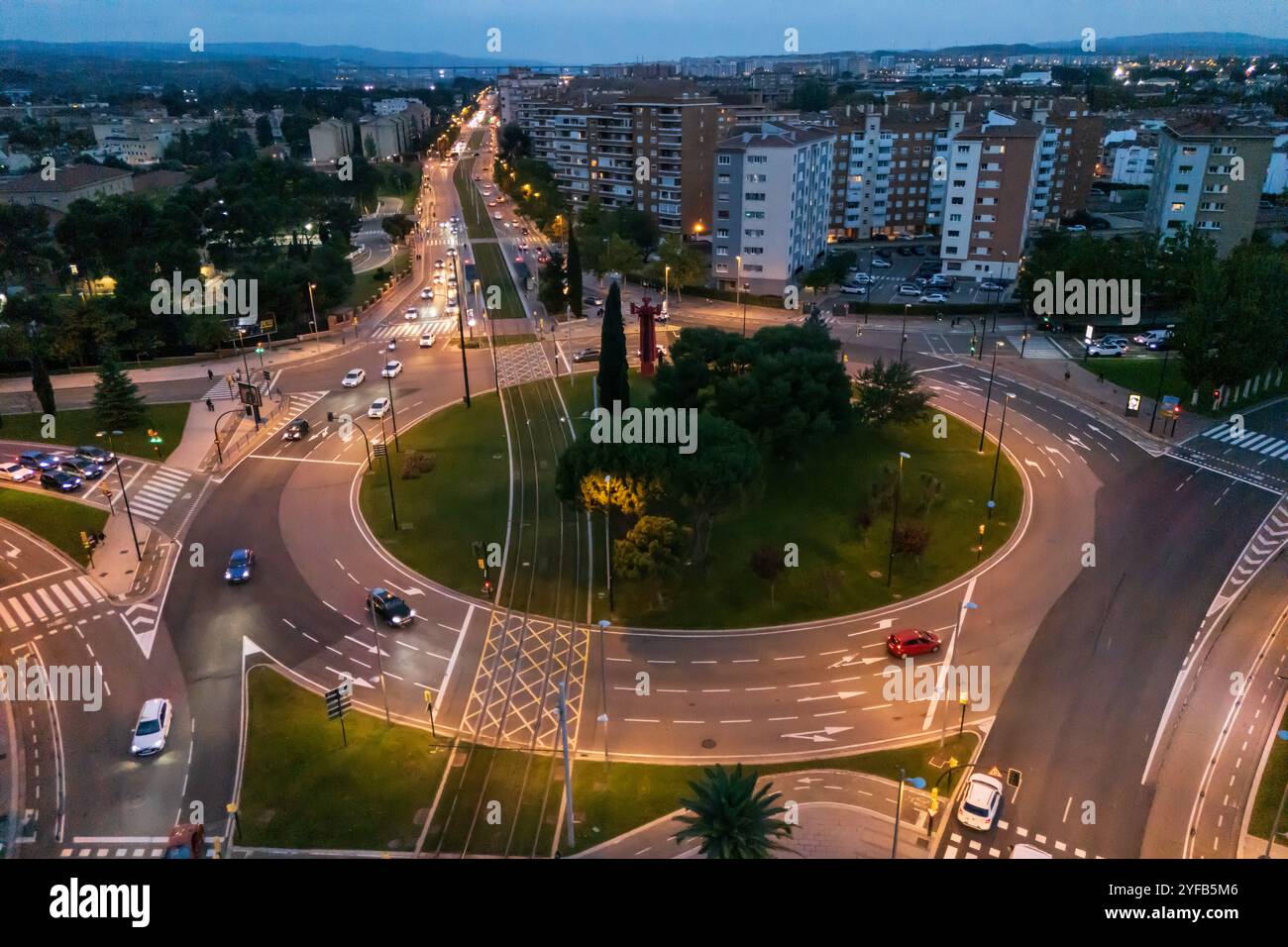 Aerial view of an illuminated roundabout at night, Zaragoza, Spain ...