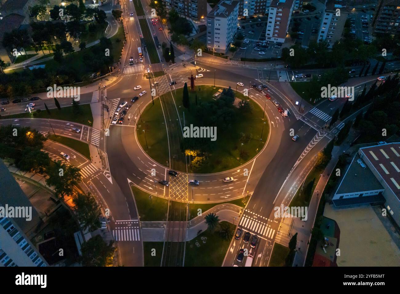 Aerial view of an illuminated roundabout at night, Zaragoza, Spain ...