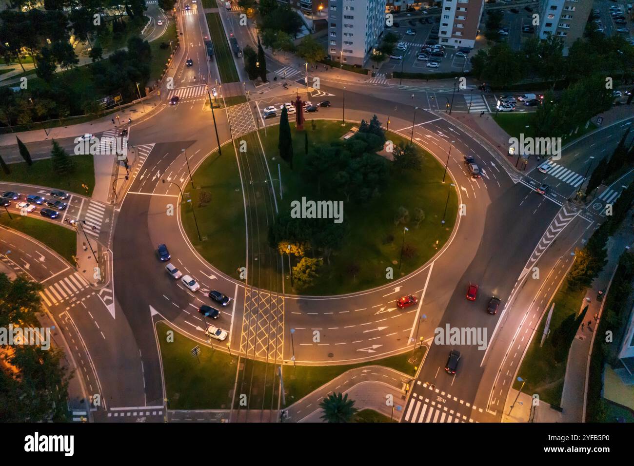Aerial view of an illuminated roundabout at night, Zaragoza, Spain ...