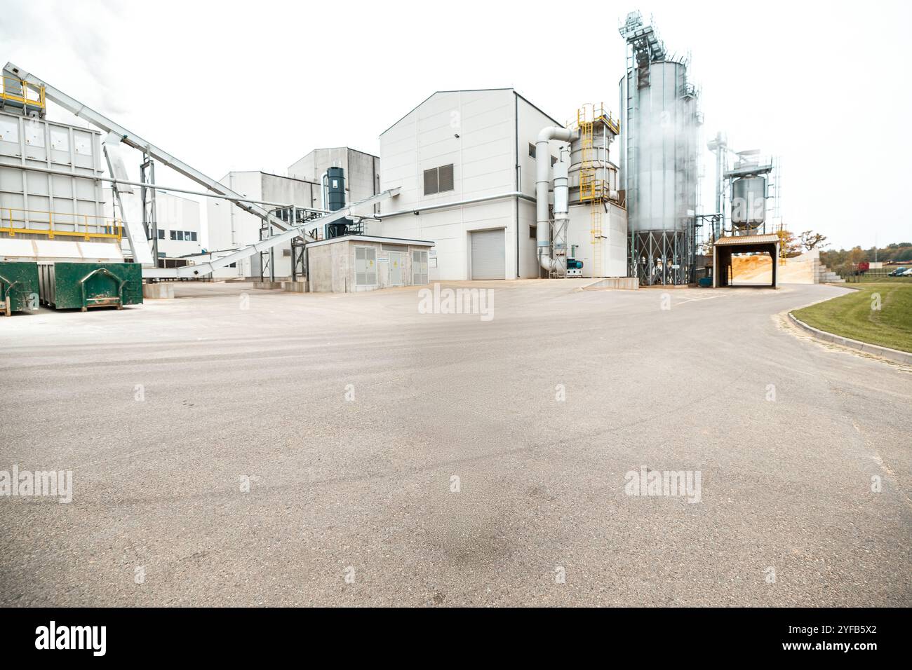 Exterior view of an industrial factory complex, showcasing modern ...