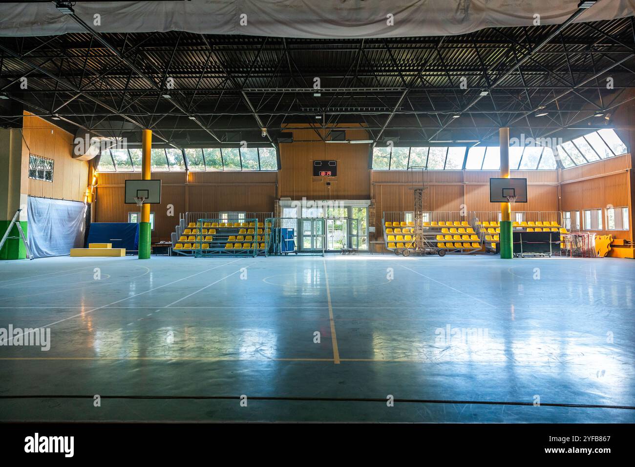 Large indoor sports facility with a basketball court, retractable ...