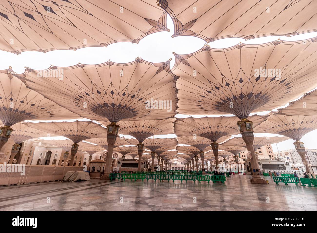 Shading umbrellas of the Prophet's Mosque in Al Haram area of Medina ...