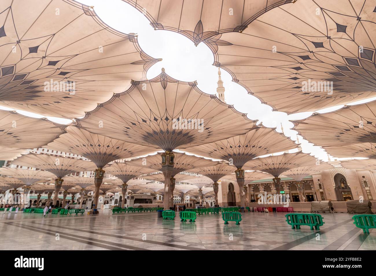 Shading umbrellas of the Prophet's Mosque in Al Haram area of Medina ...