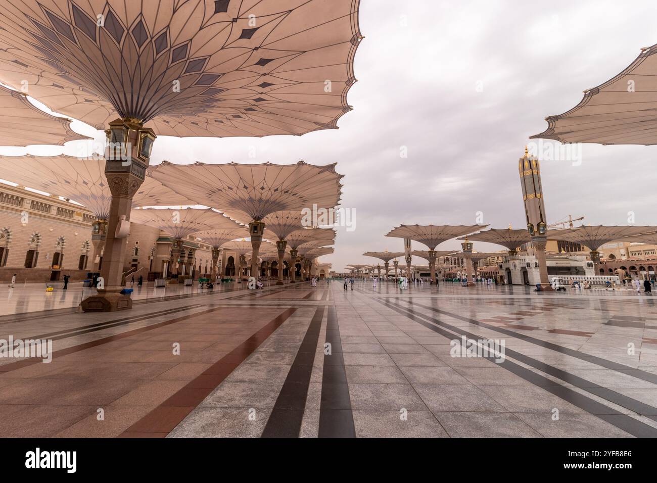 Shading umbrellas of the Prophet's Mosque in Al Haram area of Medina ...
