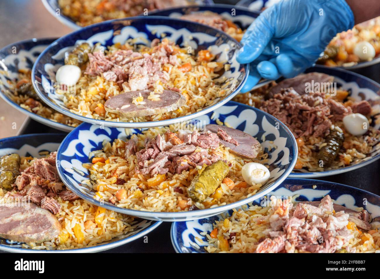 Fresh cooked wedding Uzbek plov in Tashkent, Uzbekistan Stock Photo - Alamy