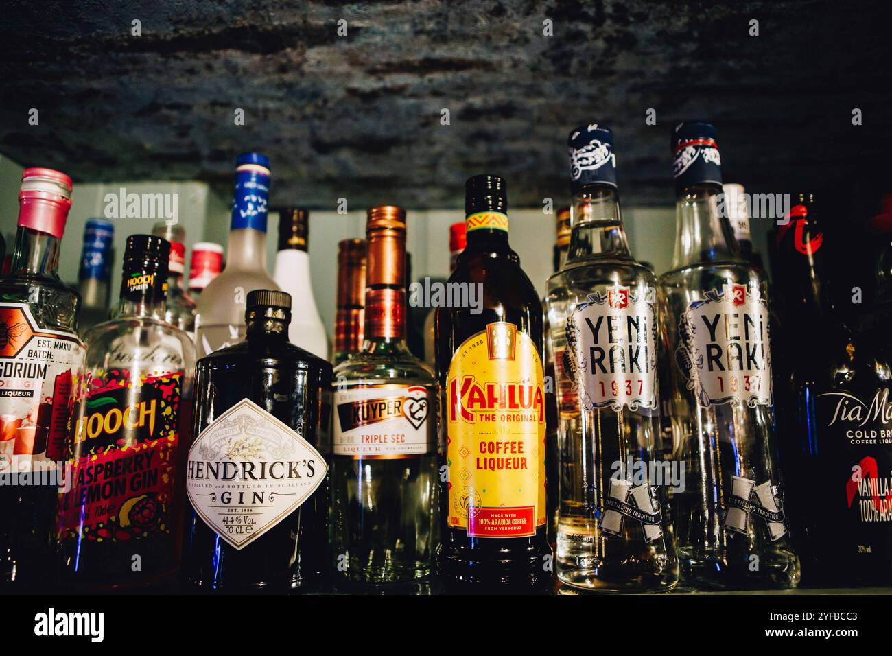 Selection of bottles of alcohol on a shelf in a Turkish restaurant ...