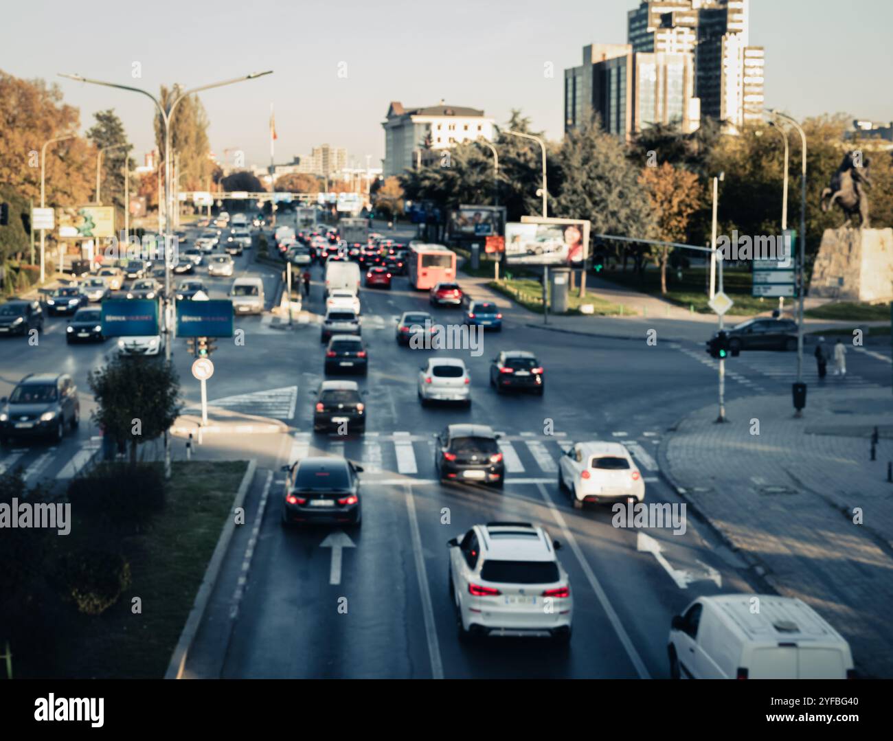 Blurred motion of cars on the motorway. Big traffic in the city. Urban highway filled out cars ...