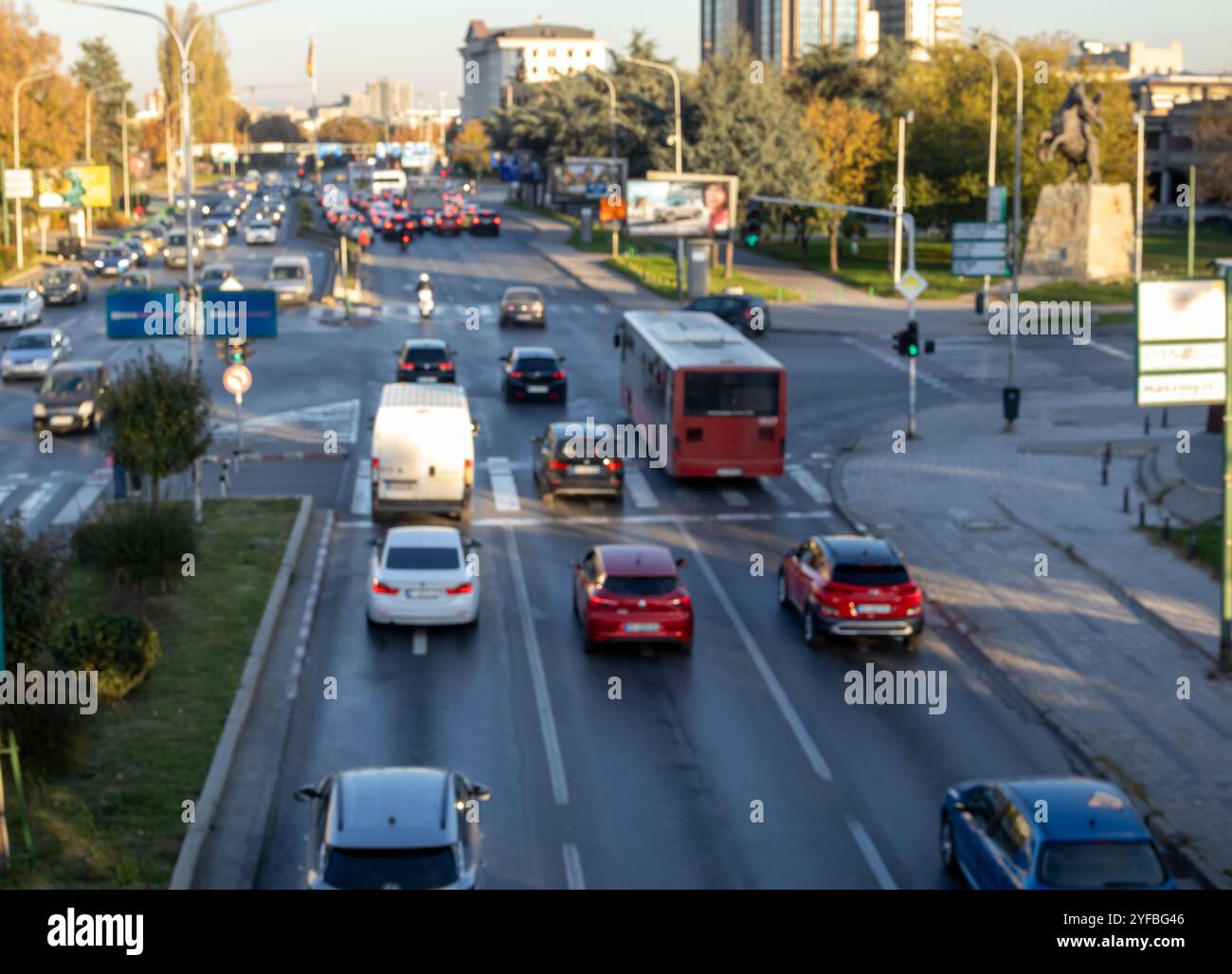 Blurred motion of cars on the motorway. Big traffic in the city. Urban highway filled out cars ...