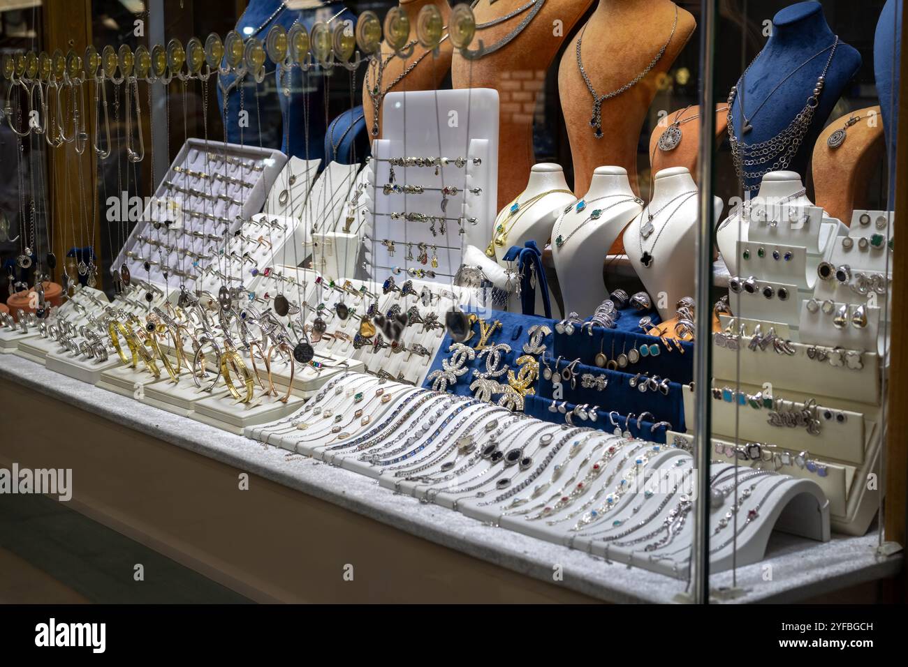 Gold jewelry display from jewelry store window. Gold Jewelry at the ...