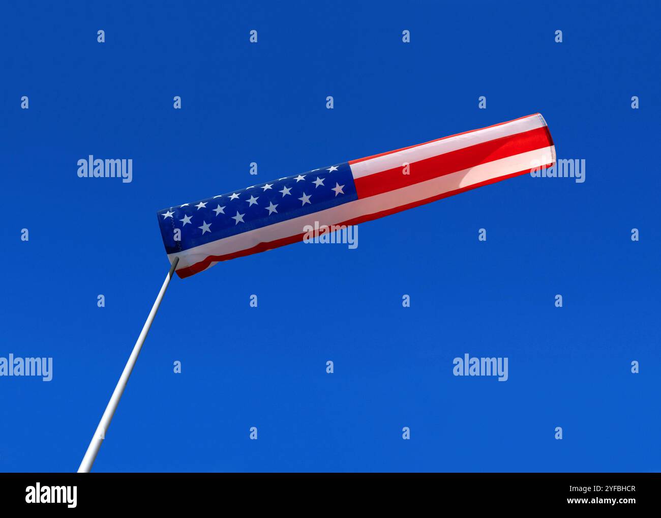 American flag blowing strong winds hi-res stock photography and images ...