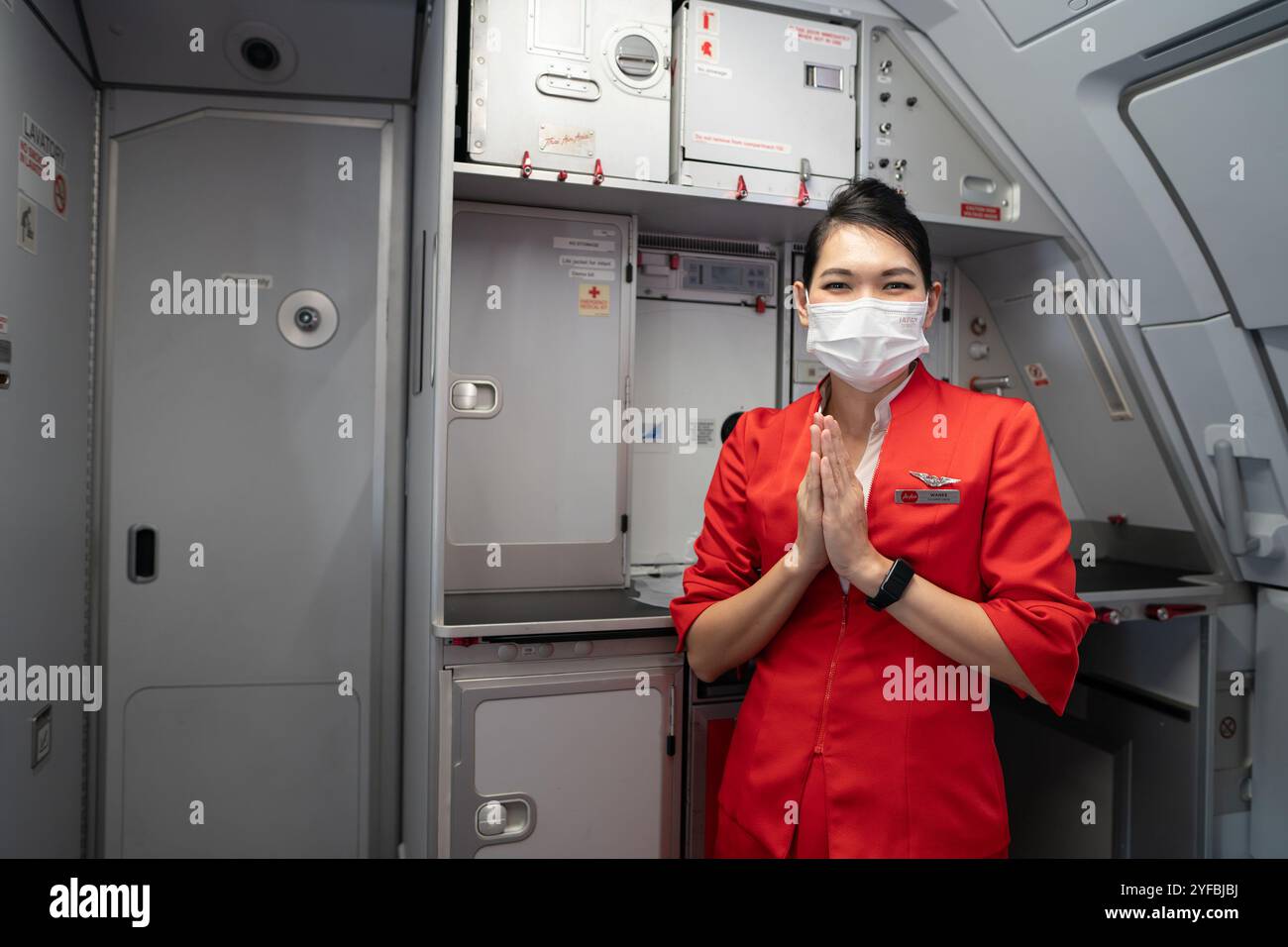 BANGKOK, THAILAND - OCTOBER 26, 2023: a female cabin crew flight ...