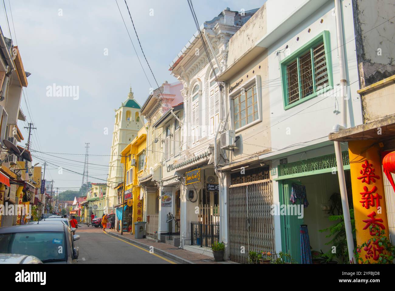 Historic buildings on Jalan Tokong Street in historic city center of Melaka, Malaysia. Historic ...