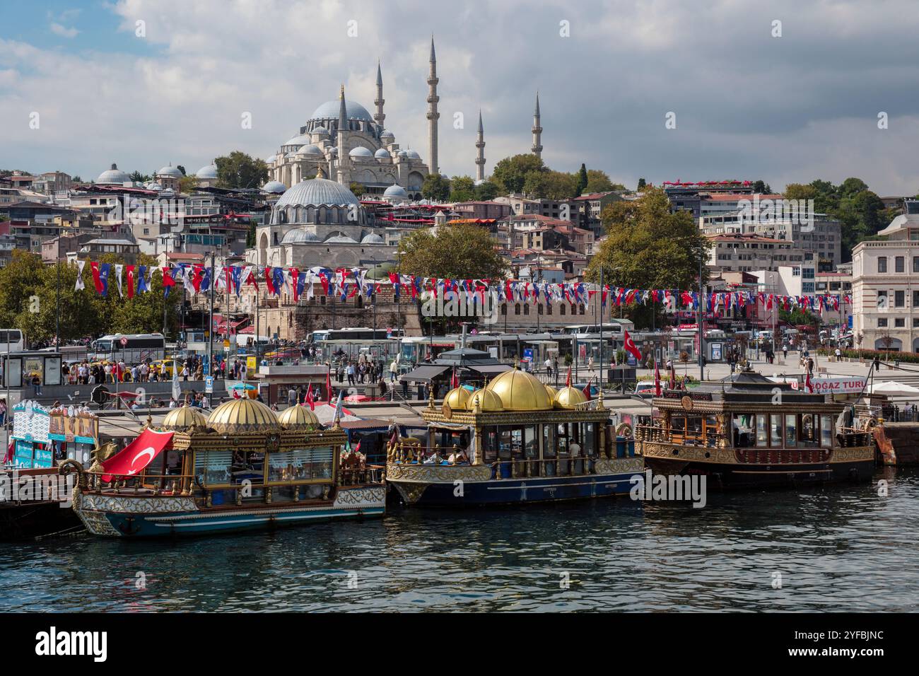The Süleymaniye Mosque and harbourside area with floating fish ...