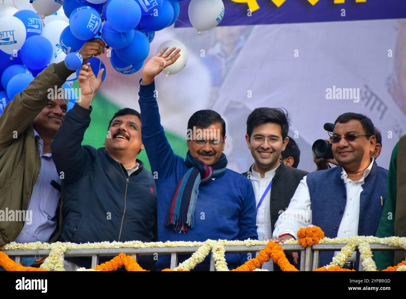 Aam Aadmi Party (AAP) head Arvind Kejriwal and his associates celebrate ...