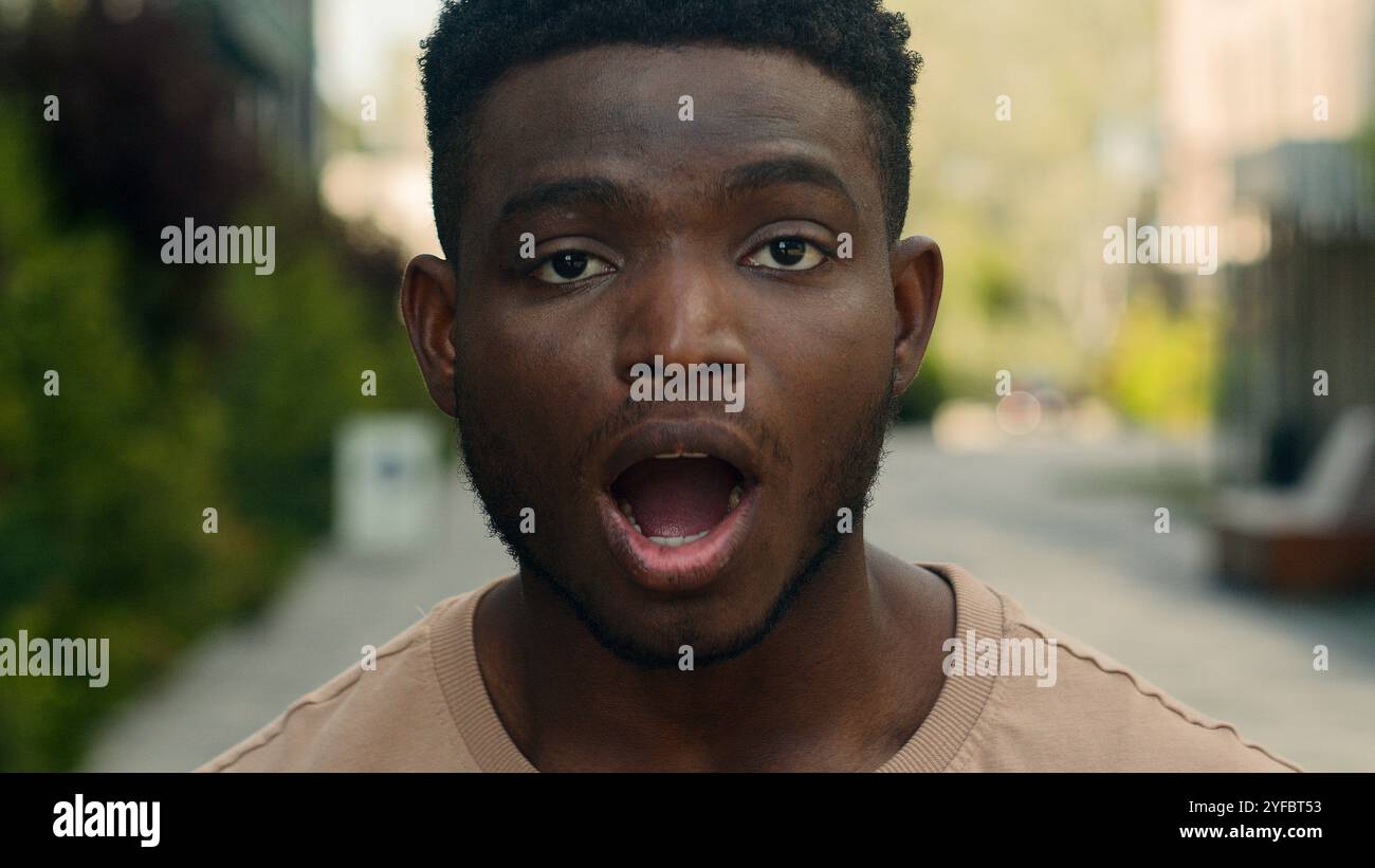 Emotional African American man amazed surprised face biracial ethnic ...