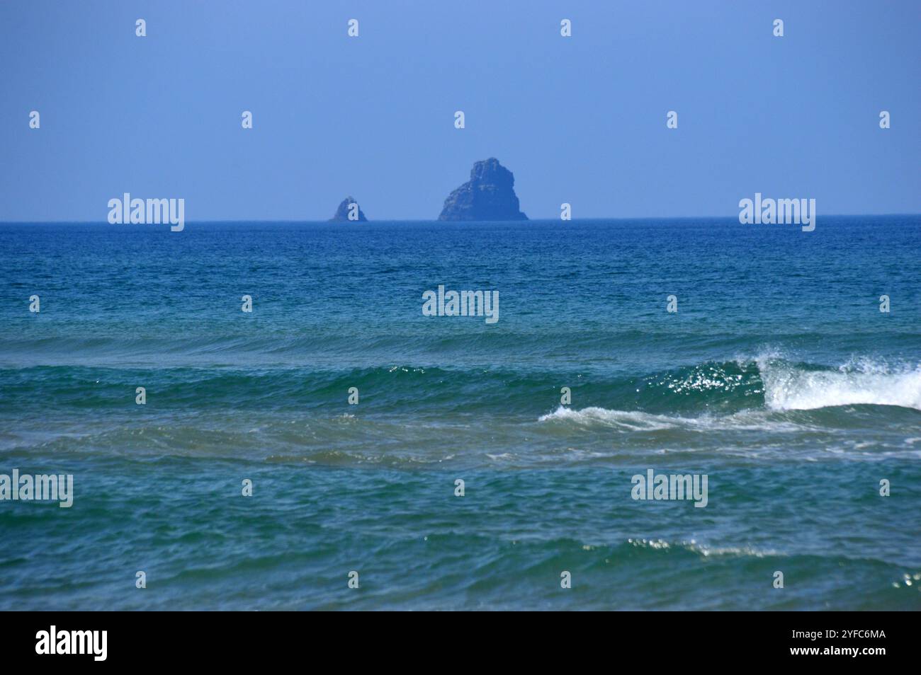 Man and his Man Islands (Bawden Rocks) from Perranporth Beach on the ...