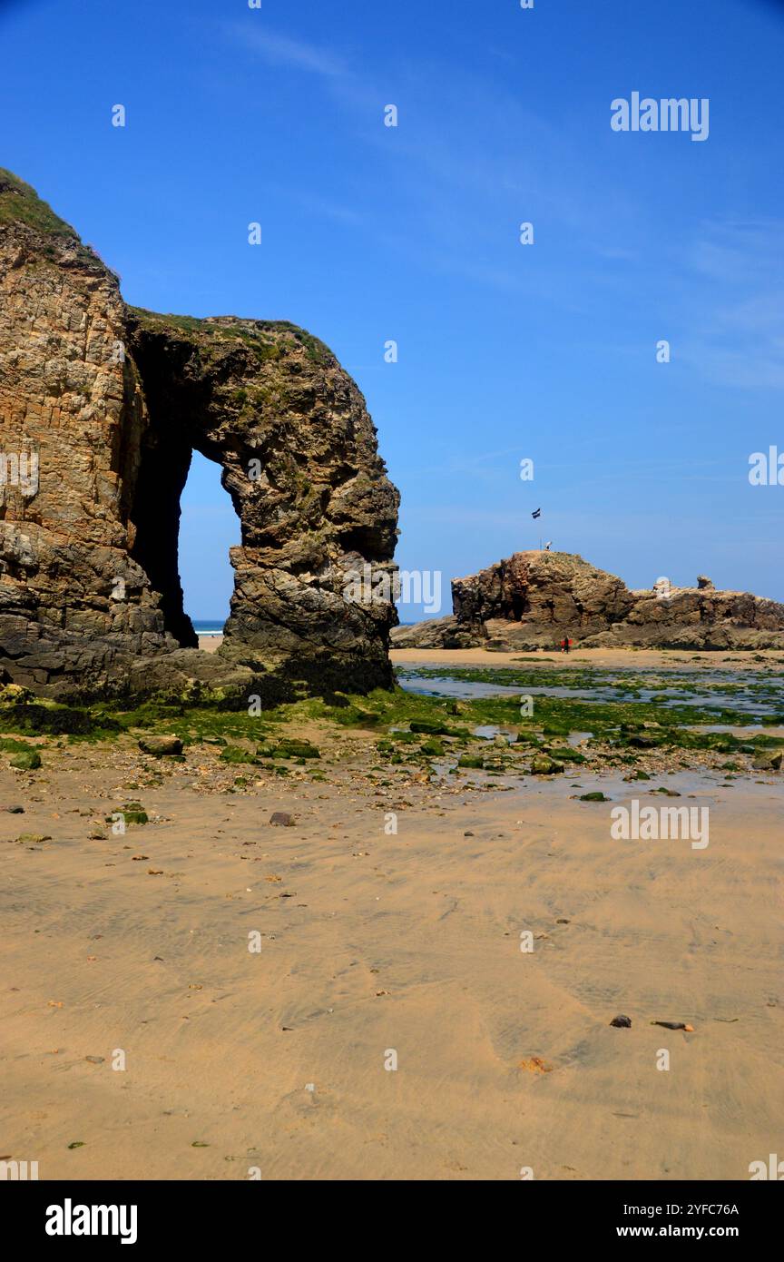 The Arch Rock Formation and Chapel Rock Island on Perranporth Beach on ...