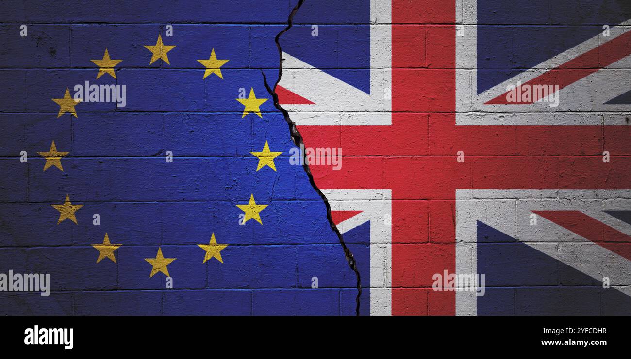 Cracked cinder block wall painted with an European Union flag on the ...