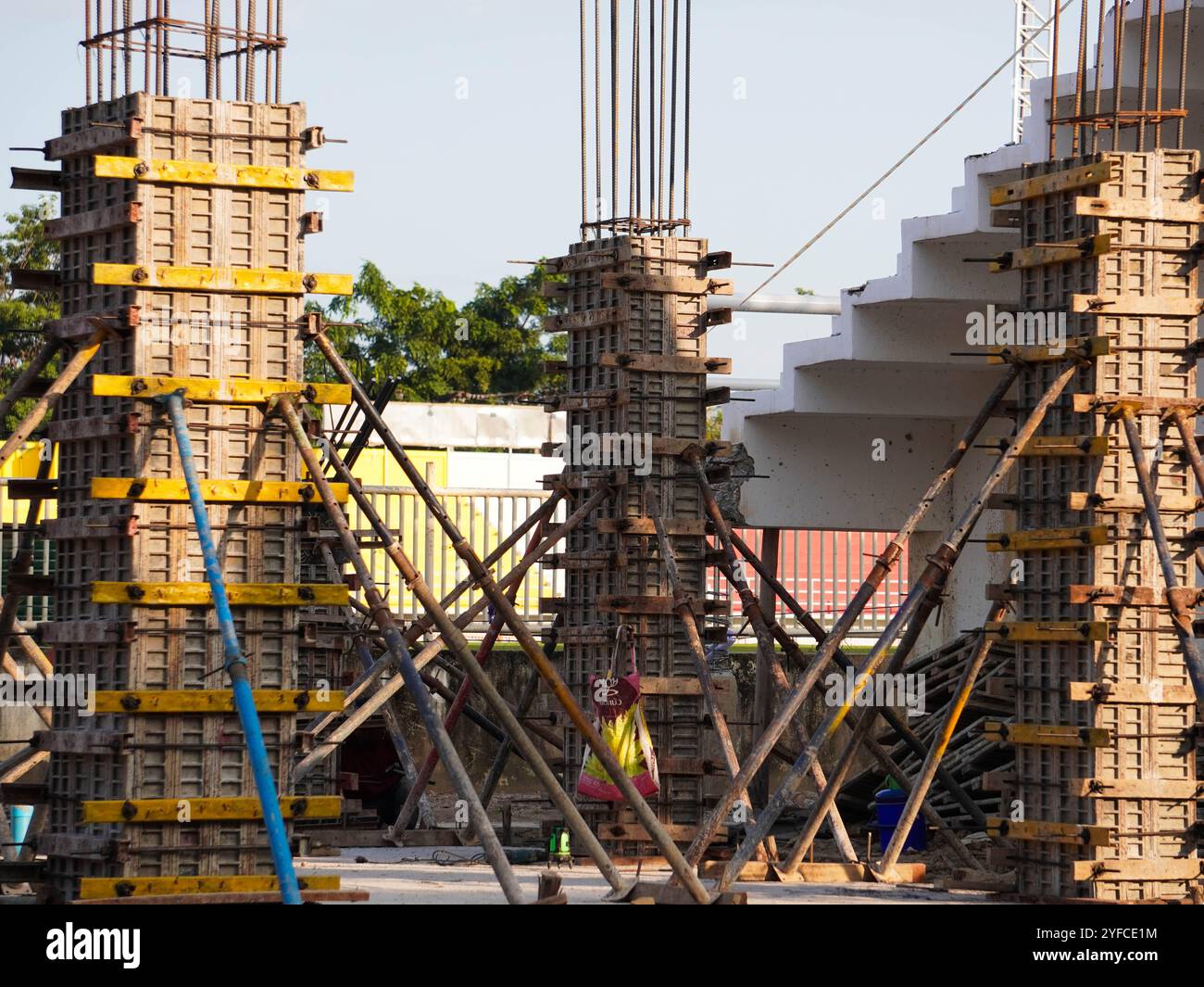 New construction site with beam frame to prepare reinforced concrete columns, foundation work ...
