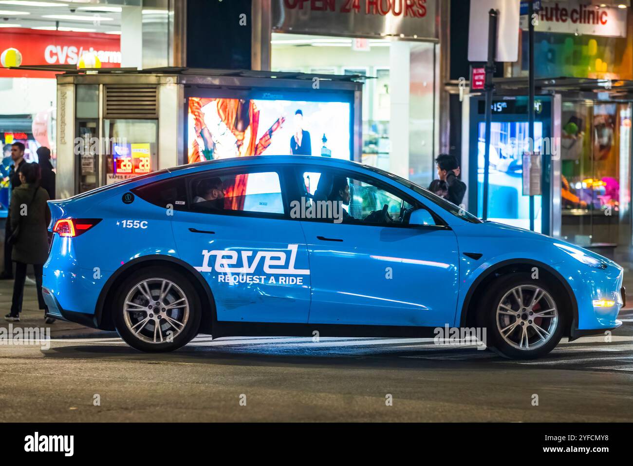 Person charging tesla model supercharger hi-res stock photography and ...